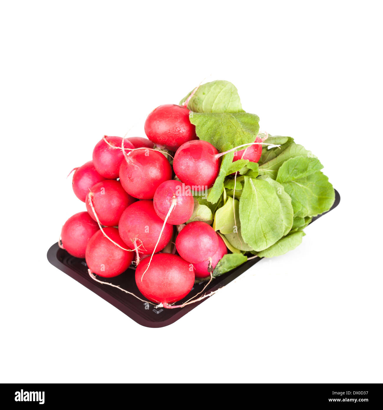 Pile of garden radish, closeup on white background Stock Photo - Alamy