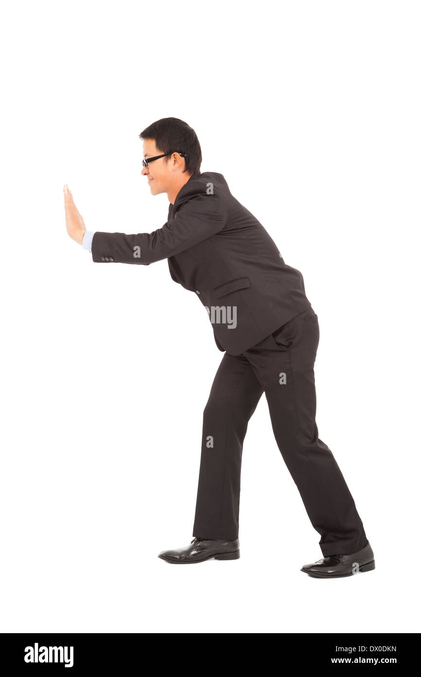 business is concentrating to push something over white background Stock ...