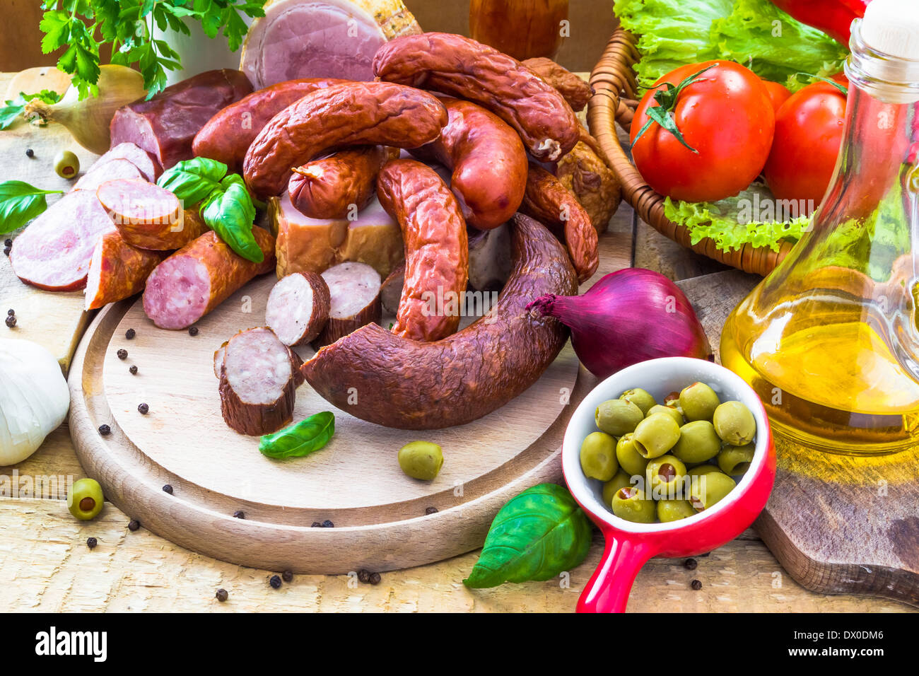 The variety of meat products with vegetables Stock Photo - Alamy