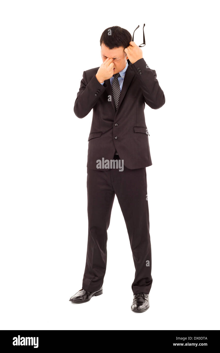 Tired businessman at work Cut Out Stock Images & Pictures - Alamy