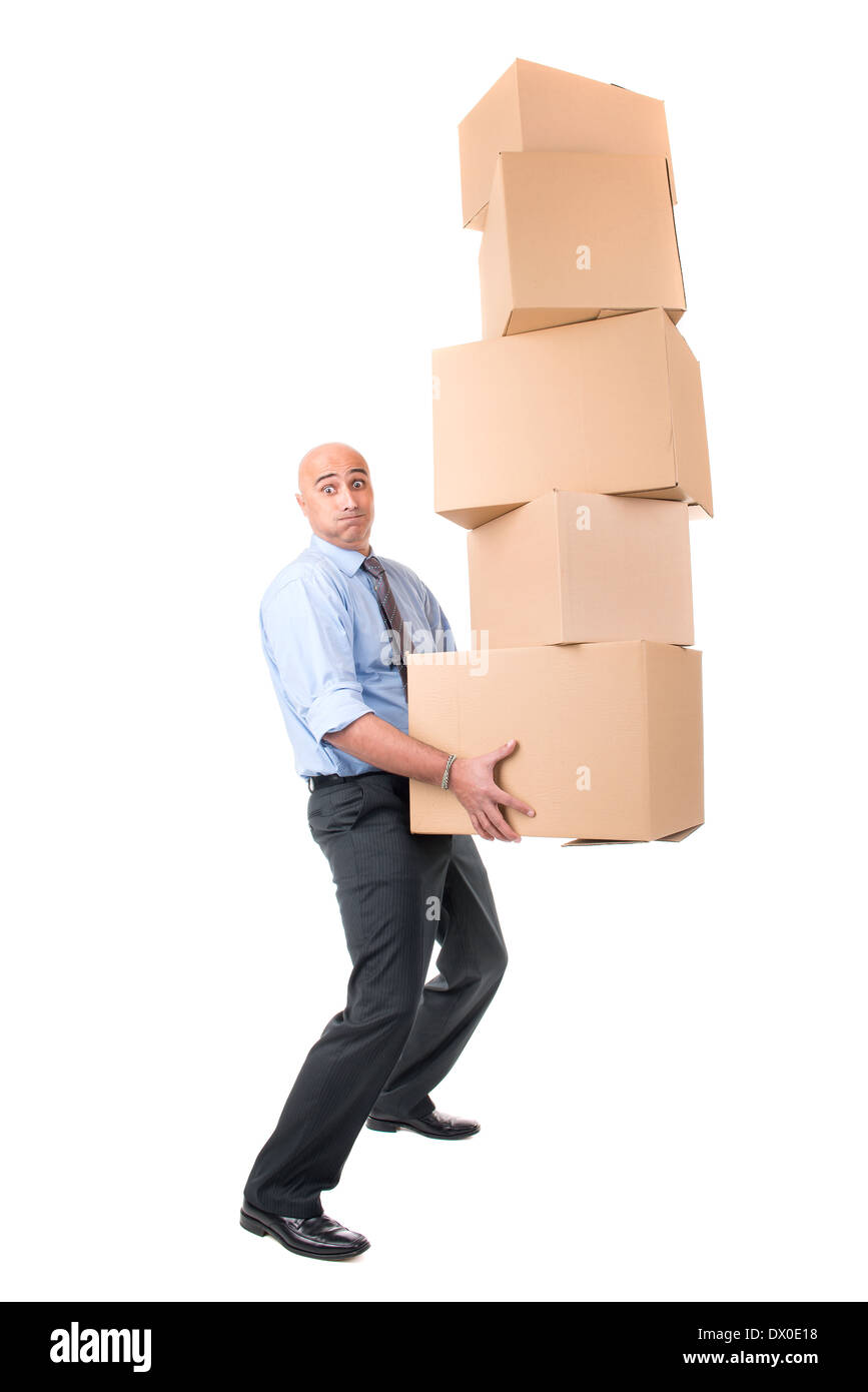 Businessman carrying a stack of cardboard boxes Stock Photo - Alamy