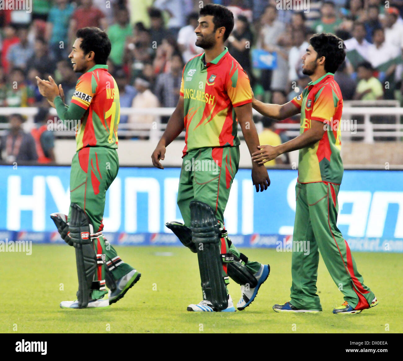 Dhaka, Bangladesh. 16th Mar, 2014. Players of Bangladesh celebrate the ...