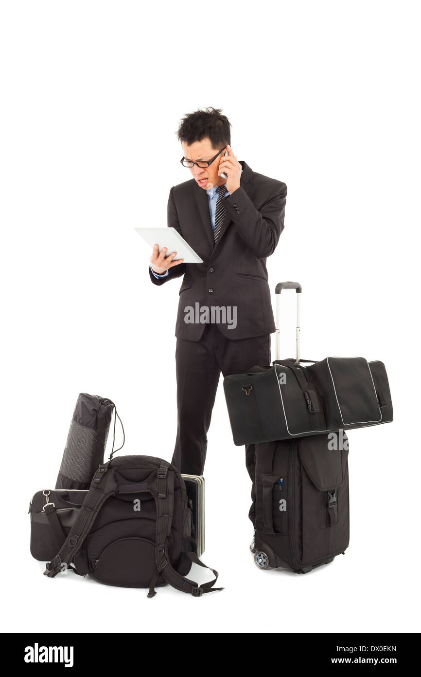 businessman wonder at reading bad news on tablet Stock Photo - Alamy