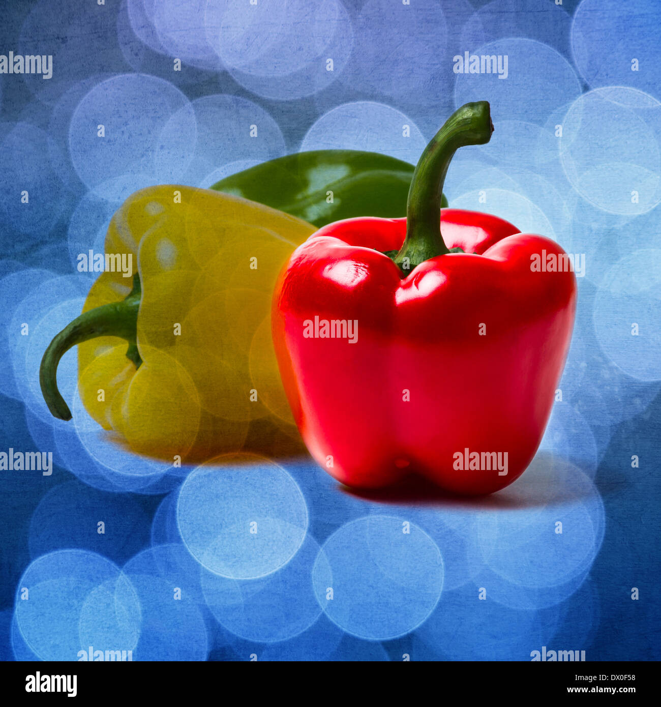 FoodThree sweet peppers of red, yellow and green color. Red pepper is a ...
