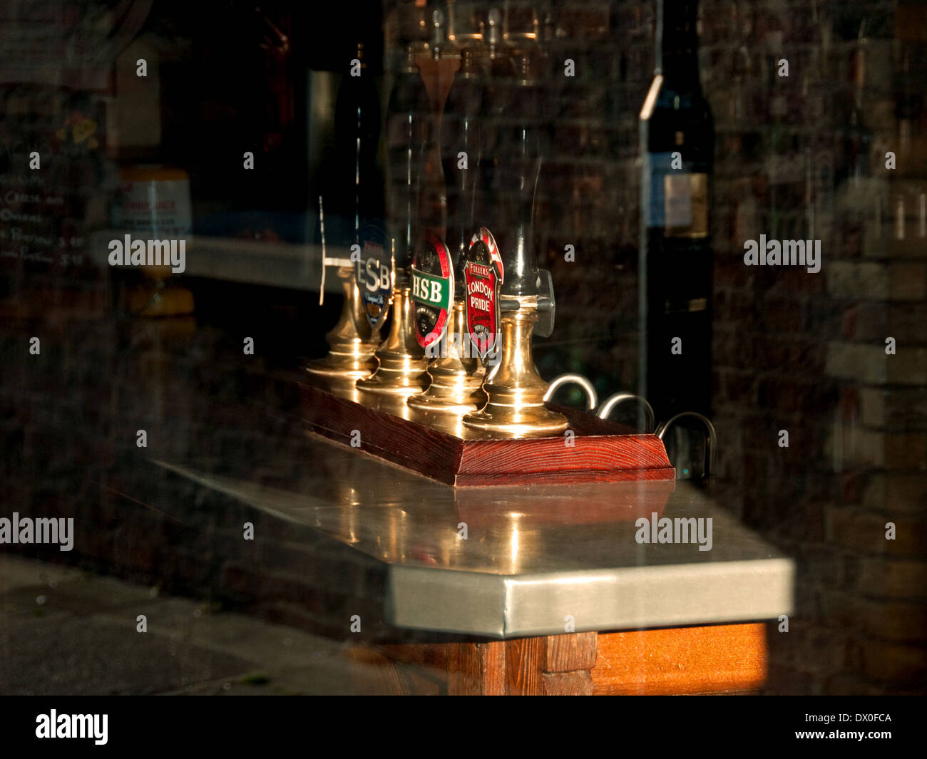 Bar with beer hand pumps Stock Photo - Alamy