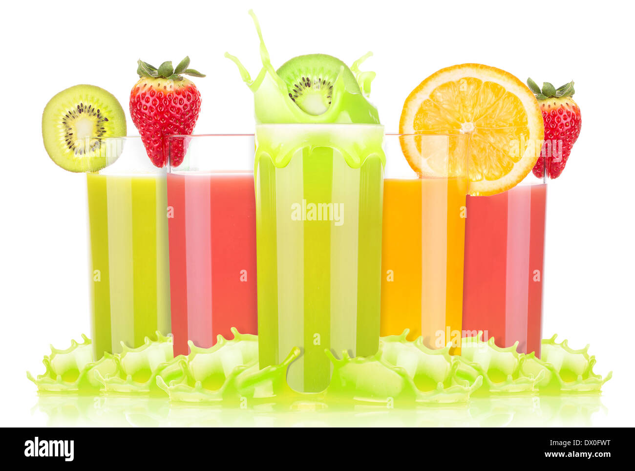 tasty summer fruit drinks in glass with splash isolated on a white ...