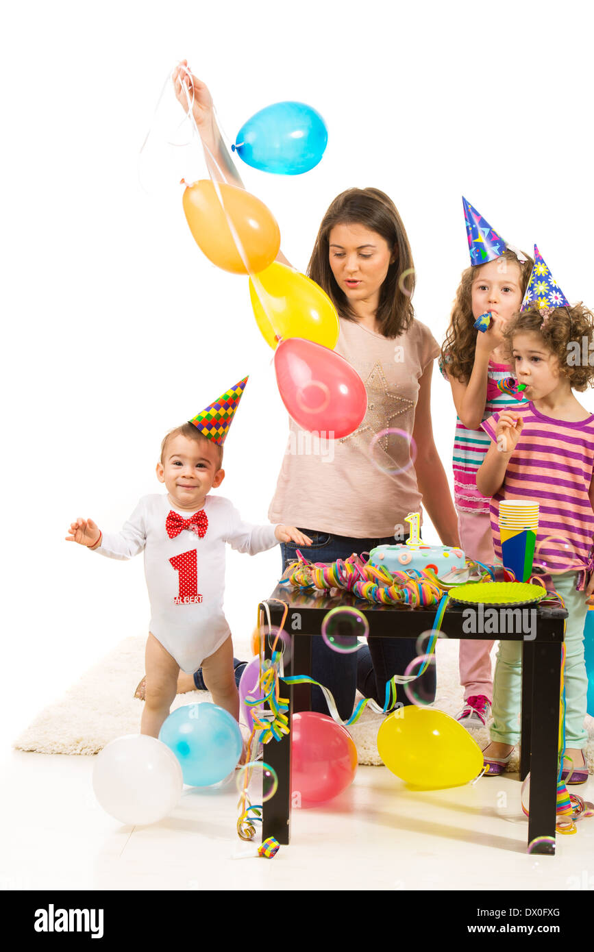 Happy family celebrating first year birthday of boy home Stock Photo ...