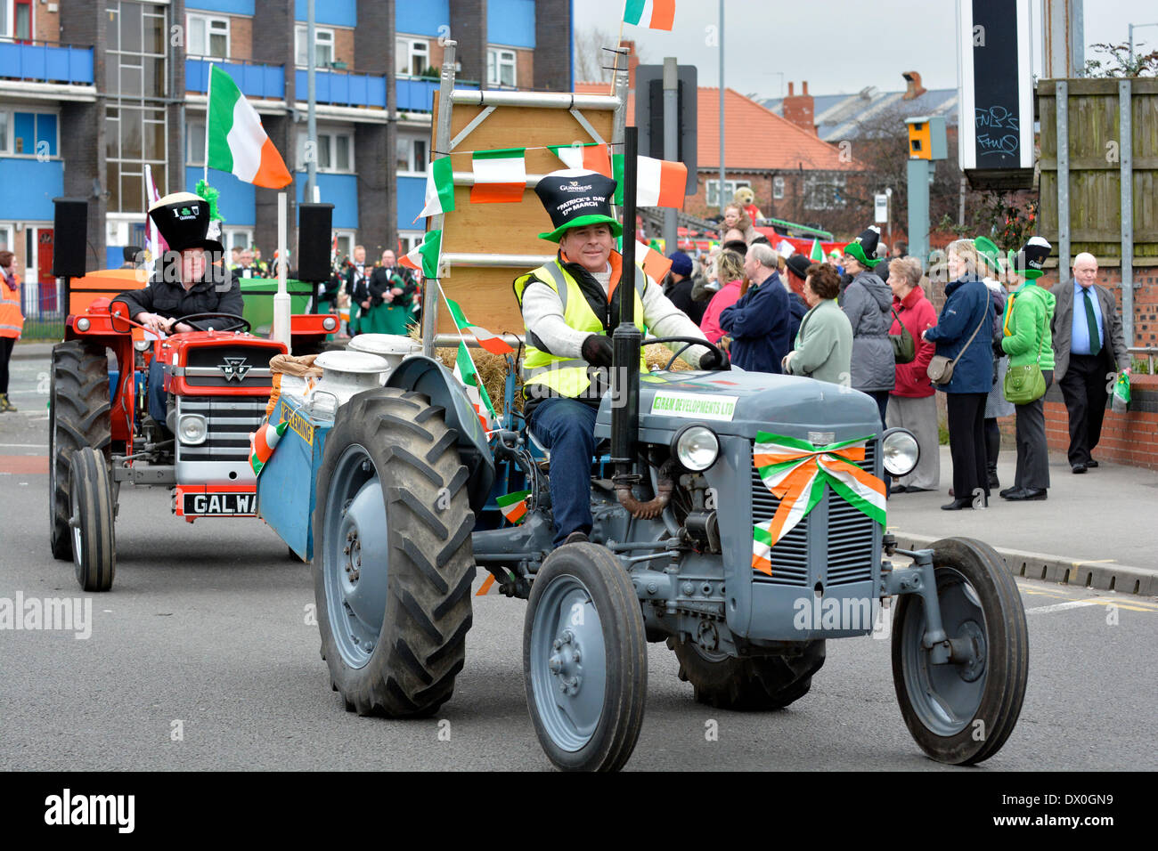 Manchester, UK 16th March 2014 A tractor decorated in Irish colours ...