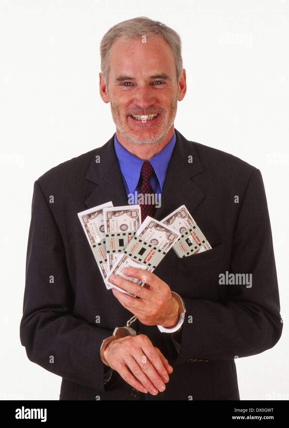 Crime, corruption, man in handcuffs with Dollars Stock Photo - Alamy