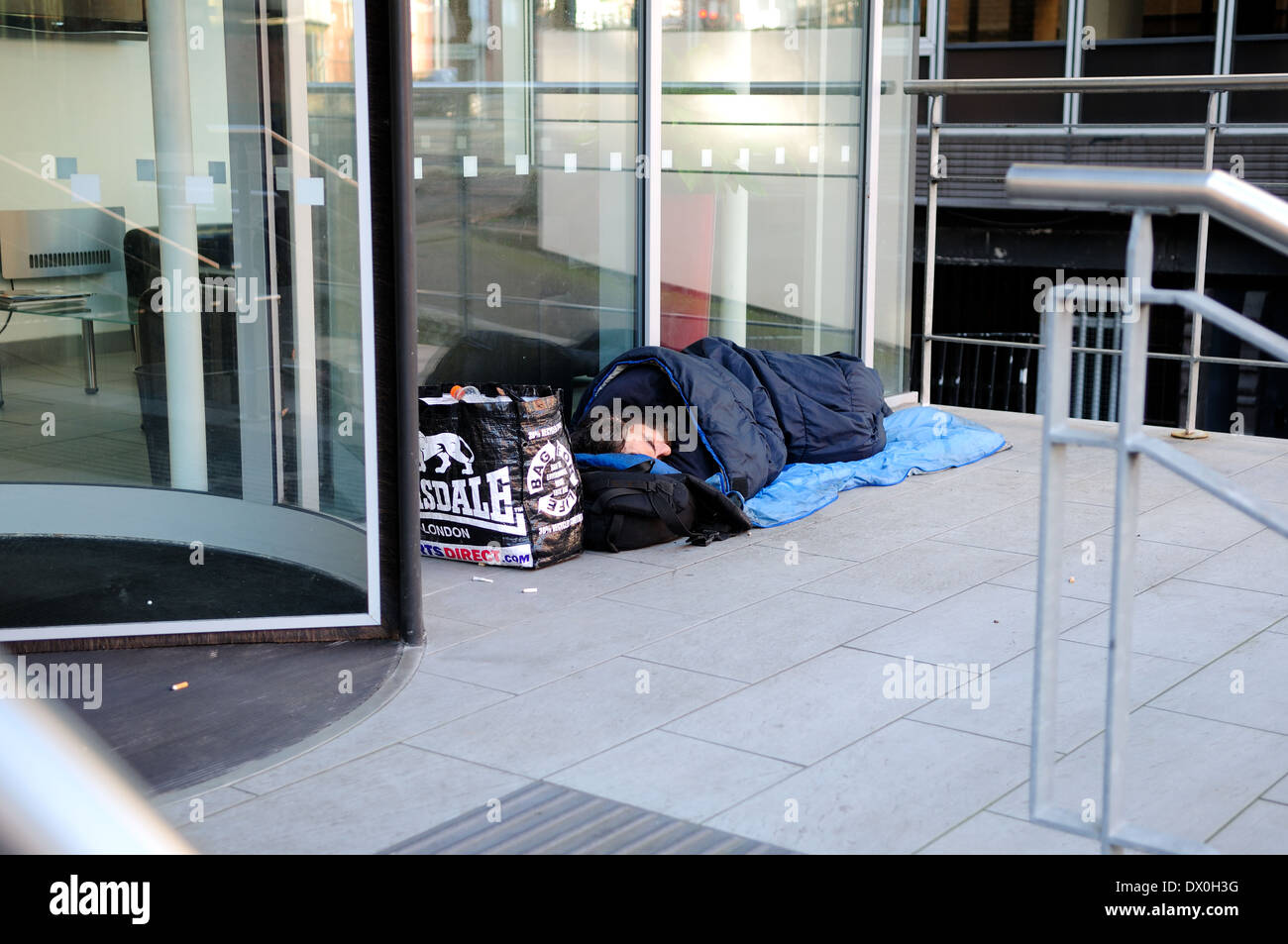 Homeless Man Sleeping Rough On The Street,Nottingham,UK Stock Photo - Alamy