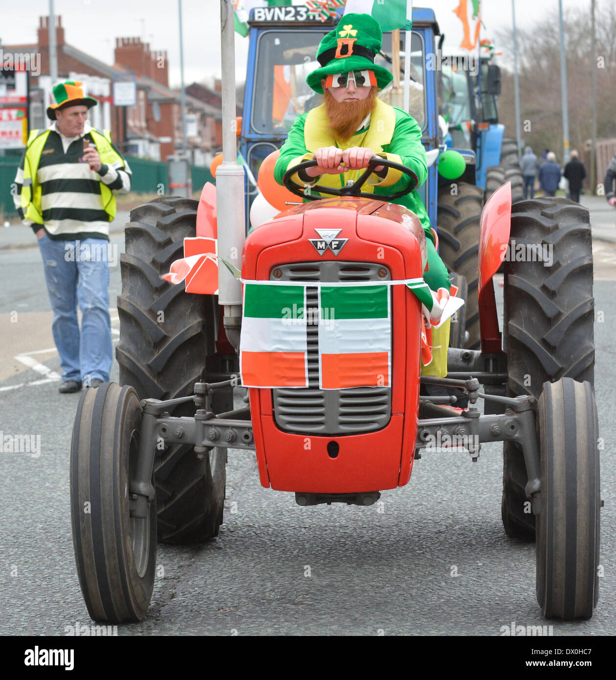 Manchester, UK 16th March 2014 A tractor with Irish flags takes part in ...