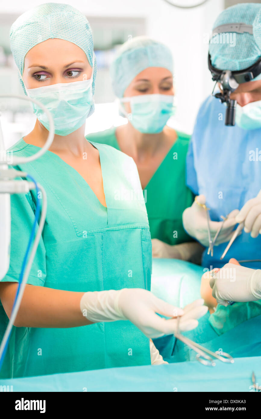 doctor surgery team in operating room or operation theter of hospital ...