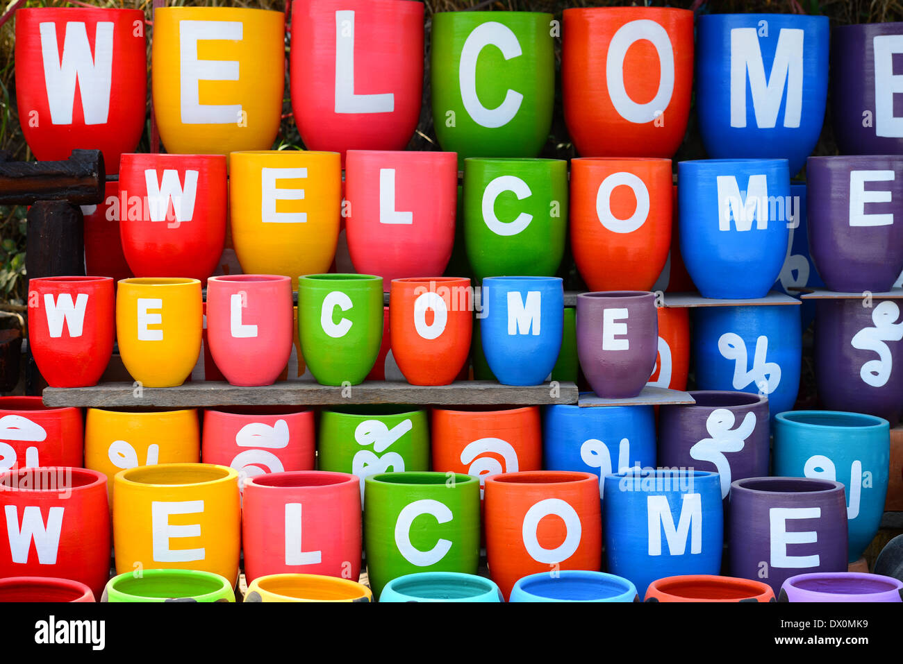 Welcome word on colorful pot Stock Photo - Alamy