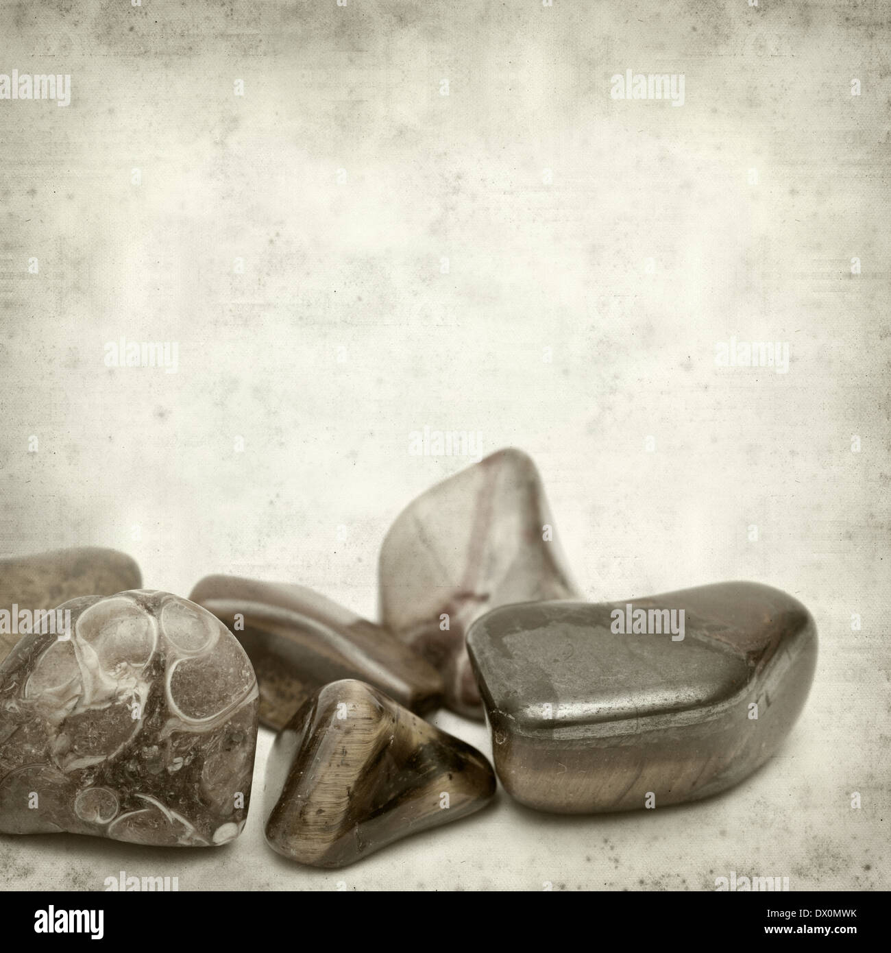 textured old paper background with semi-precious stones Stock Photo - Alamy