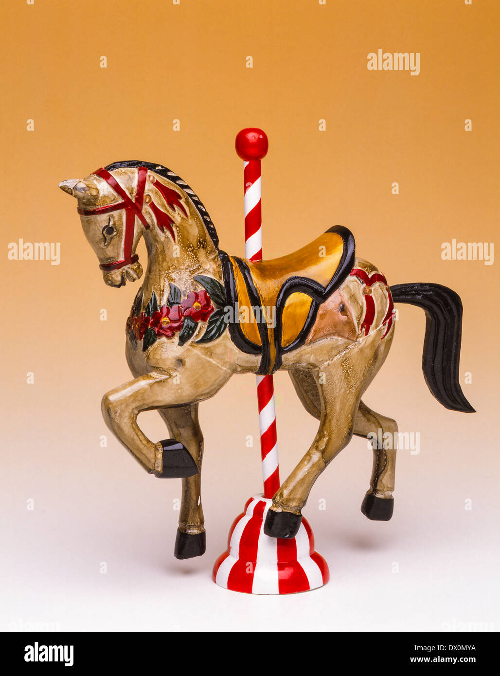 Merry-go-round horse wooden toy Stock Photo - Alamy