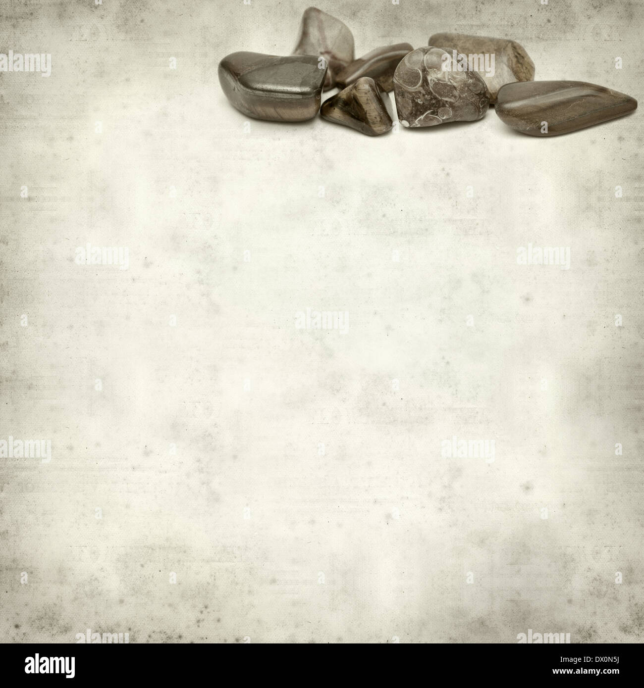 textured old paper background with semi-precious stones Stock Photo - Alamy