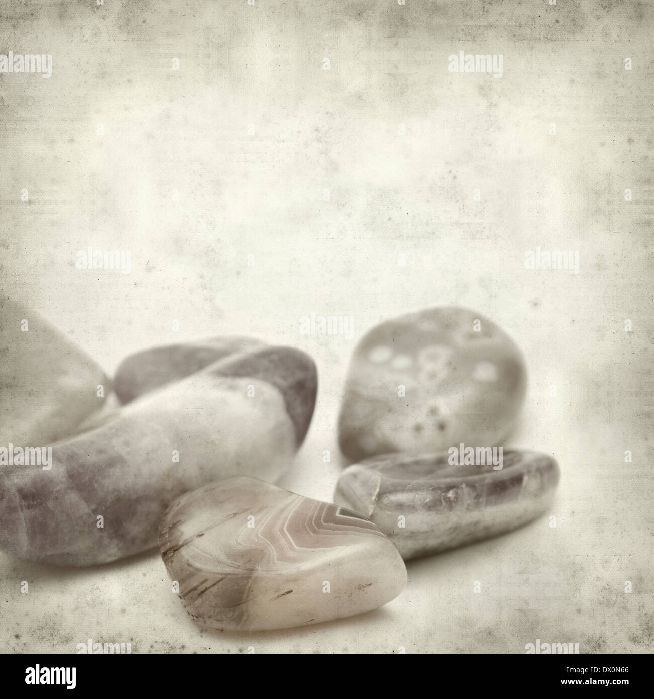 textured old paper background with semi-precious stones Stock Photo - Alamy