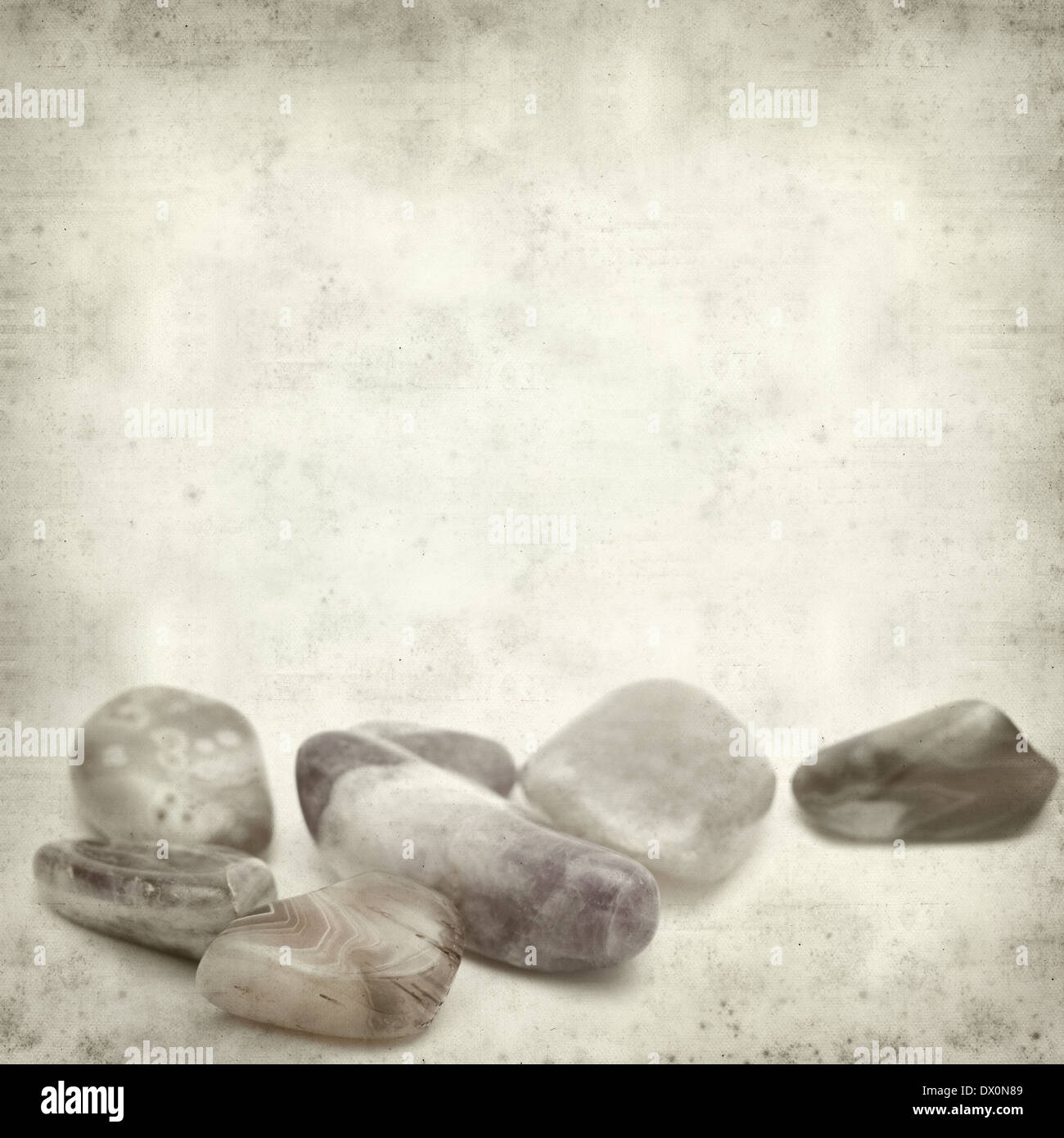 textured old paper background with semi-precious stones Stock Photo - Alamy