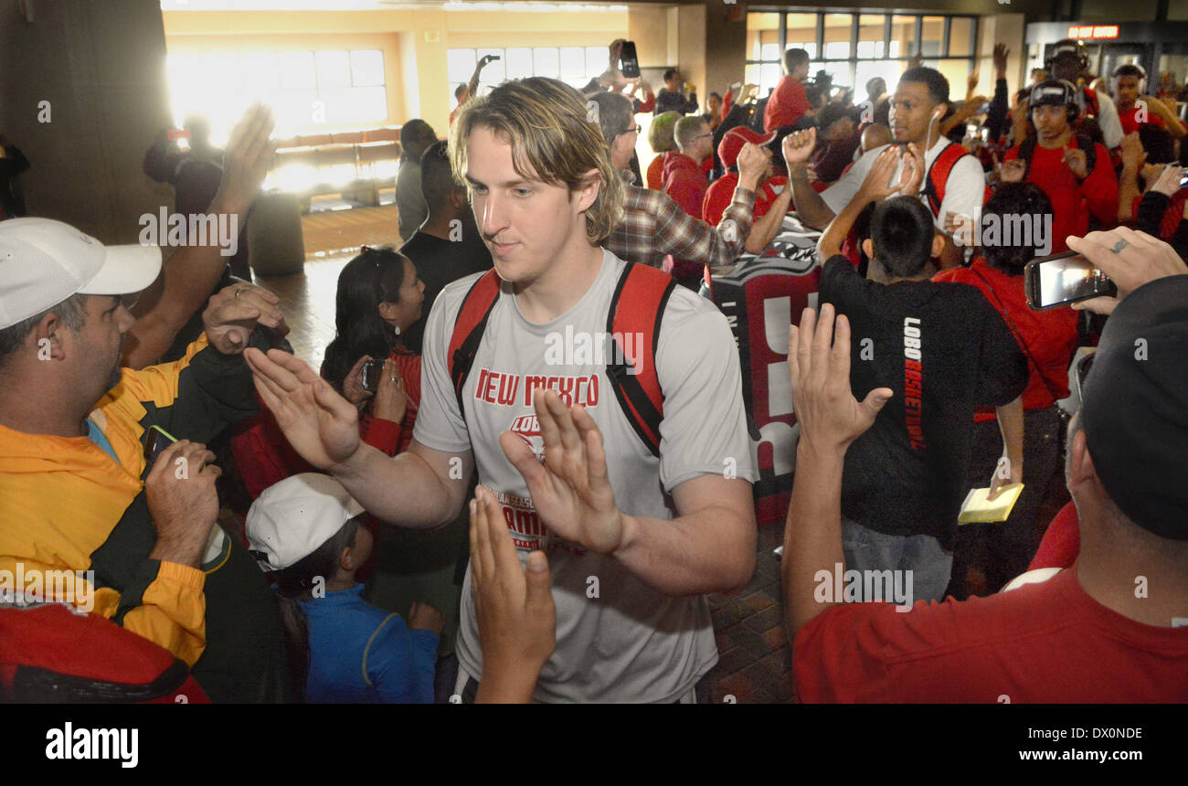 Usa. 15th Mar, 2014. SPORTS -- Cameron Bairstow high fives Lobo fans as ...