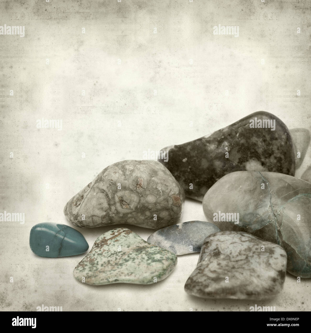 textured old paper background with semi-precious stones Stock Photo - Alamy