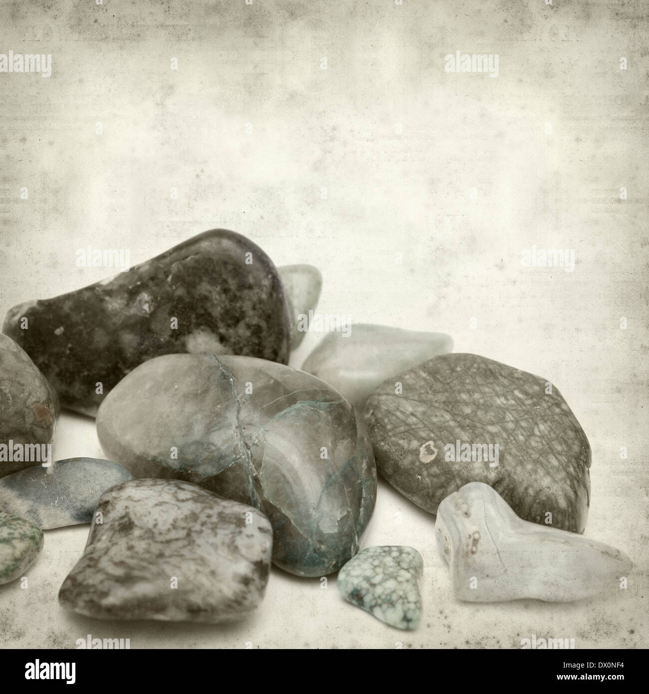 textured old paper background with semi-precious stones Stock Photo - Alamy