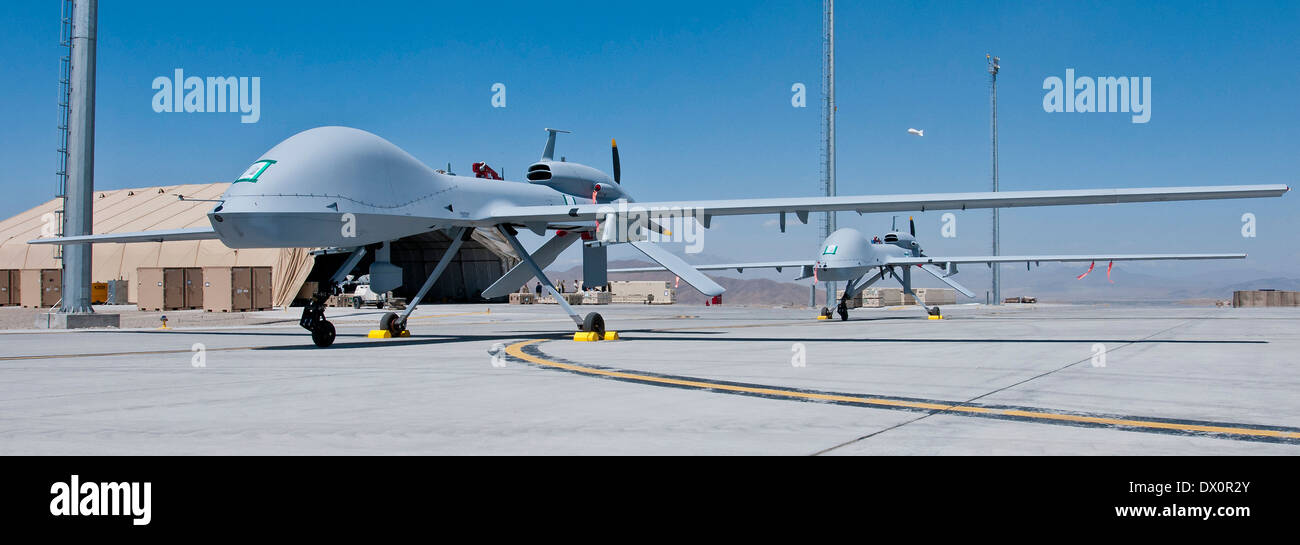 Two freshly assembled MQ-1C Grey Eagle unmanned aerial vehicles sit on ...