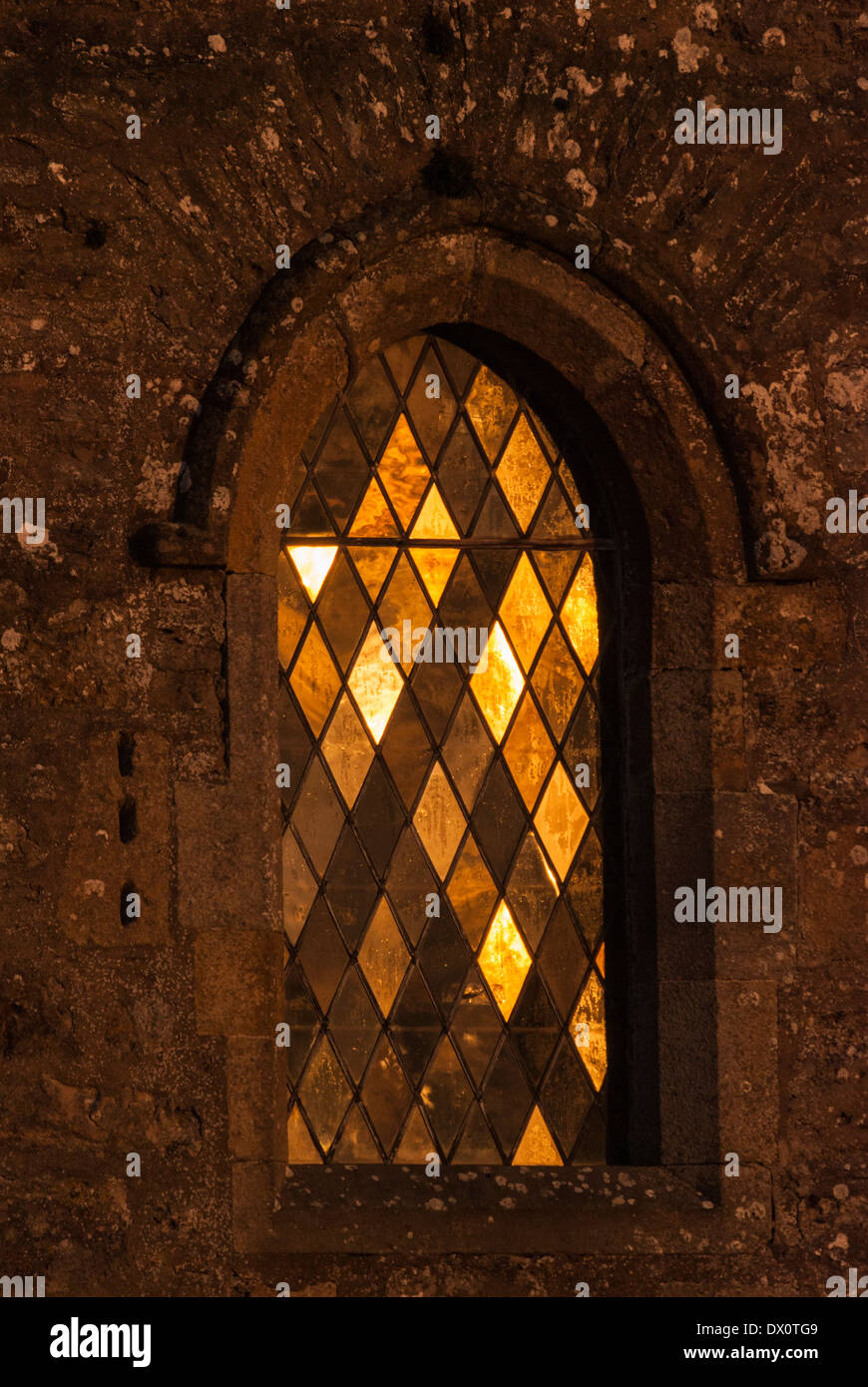 Evening sun reflected in a stained glass window Stock Photo - Alamy