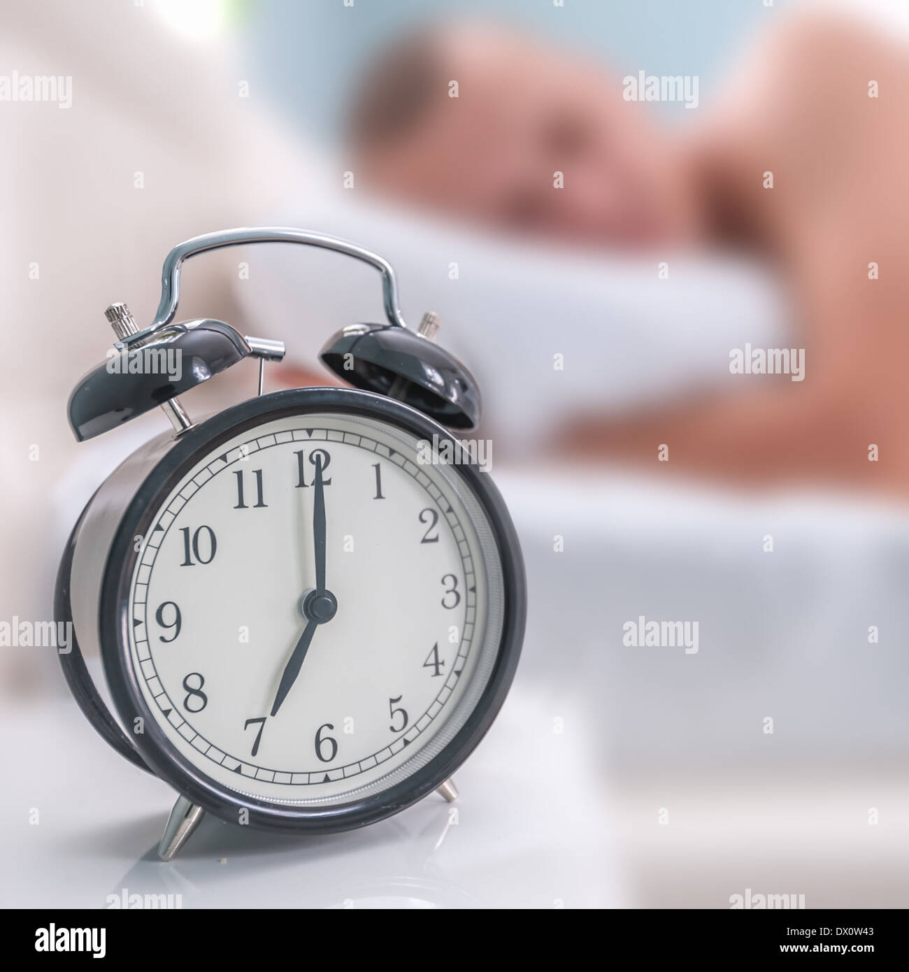 One black clock on hi-res stock photography and images - Alamy