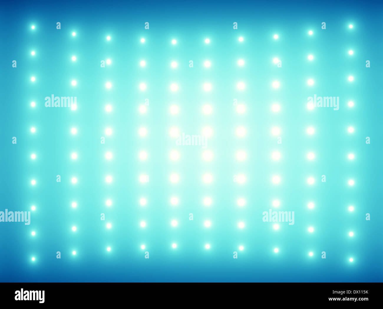 Blue background with tiny light bulbs Stock Photo - Alamy