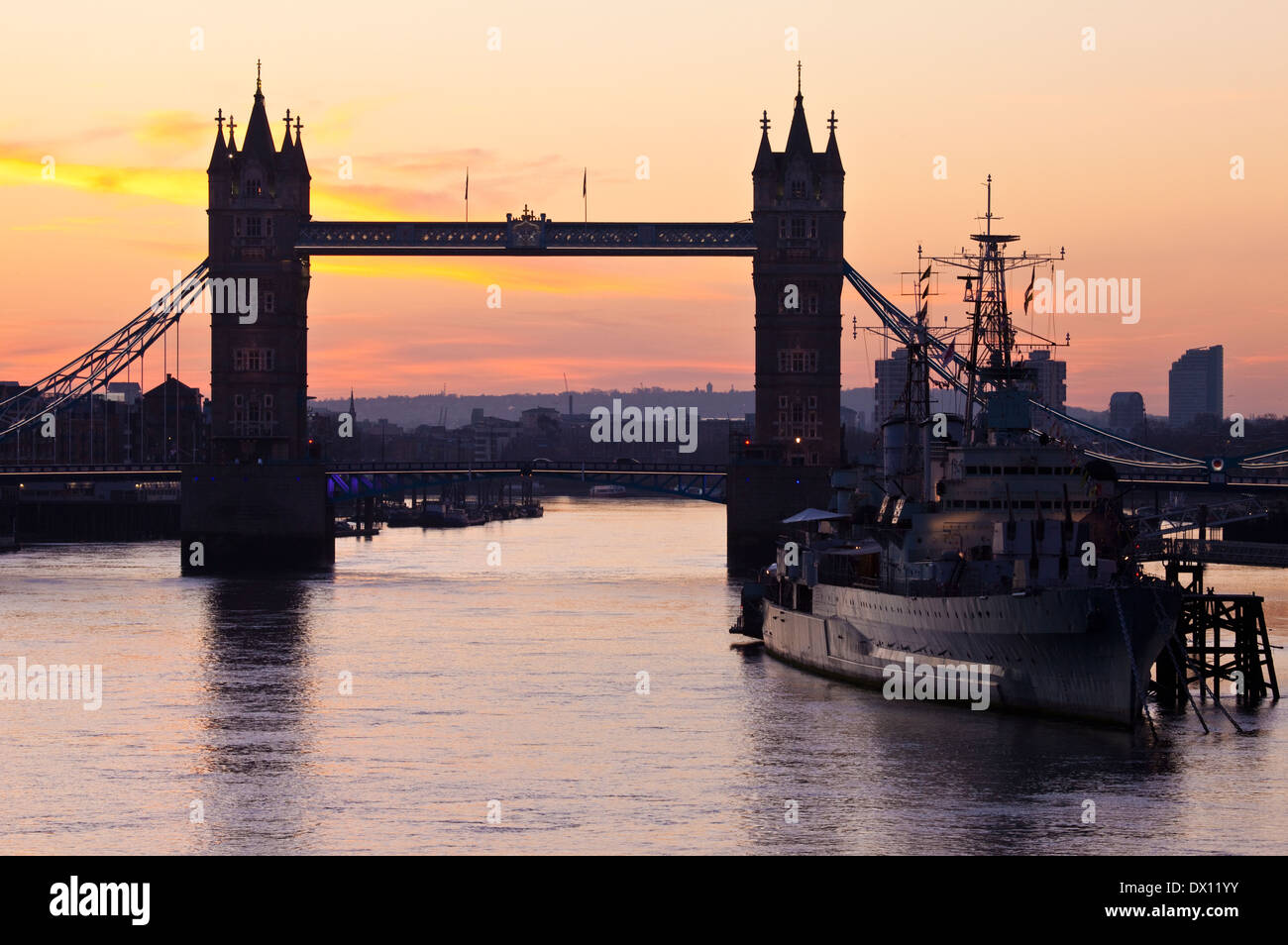The beautiful sunrise behind Tower Bridge and the HMS Belfast in London Stock Photo - Alamy