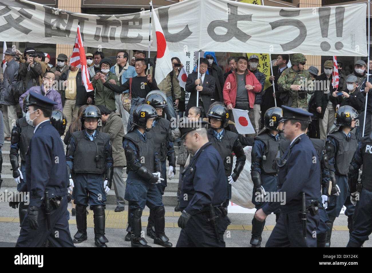 Tokyo, Japan. 16th Mar, 2014. Anti-racist Japanese clashed with members ...