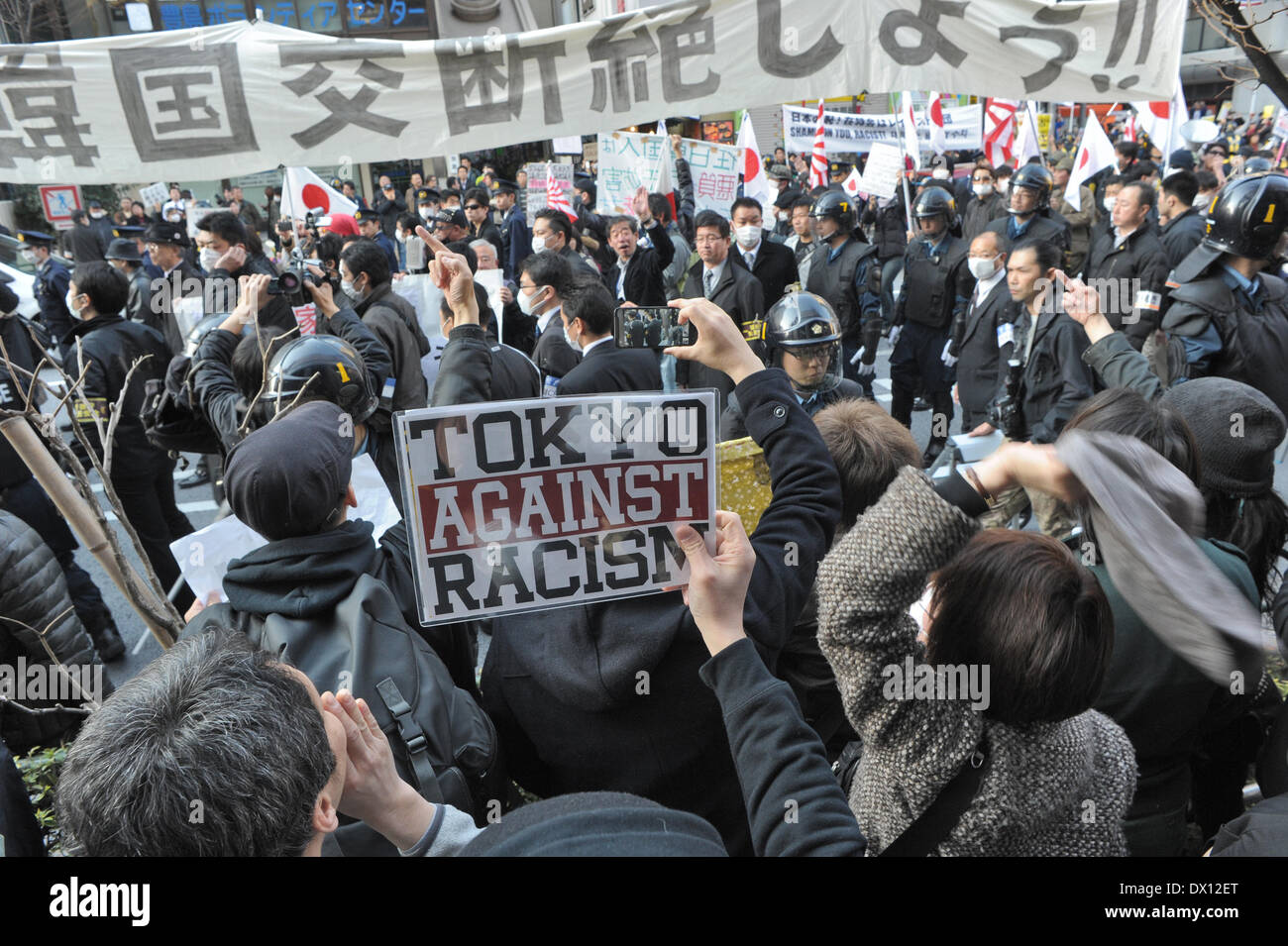 Tokyo, Japan. 16th Mar, 2014. Anti-racist Japanese clashed with members ...