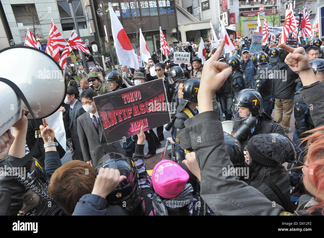 Tokyo, Japan. 16th Mar, 2014. Anti-racist Japanese clashed with members ...