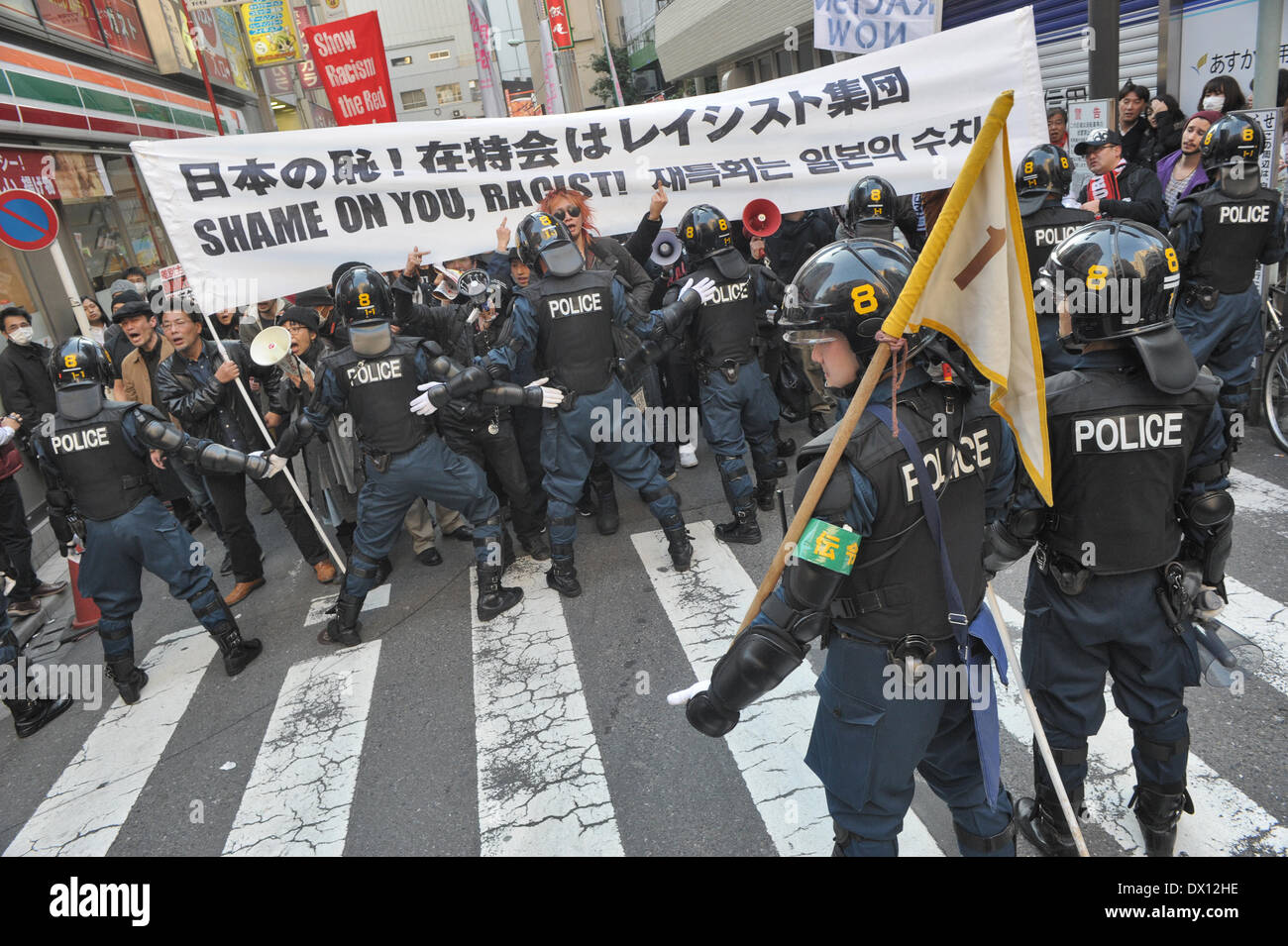 Tokyo, Japan. 16th Mar, 2014. Anti-racist Japanese clashed with members ...