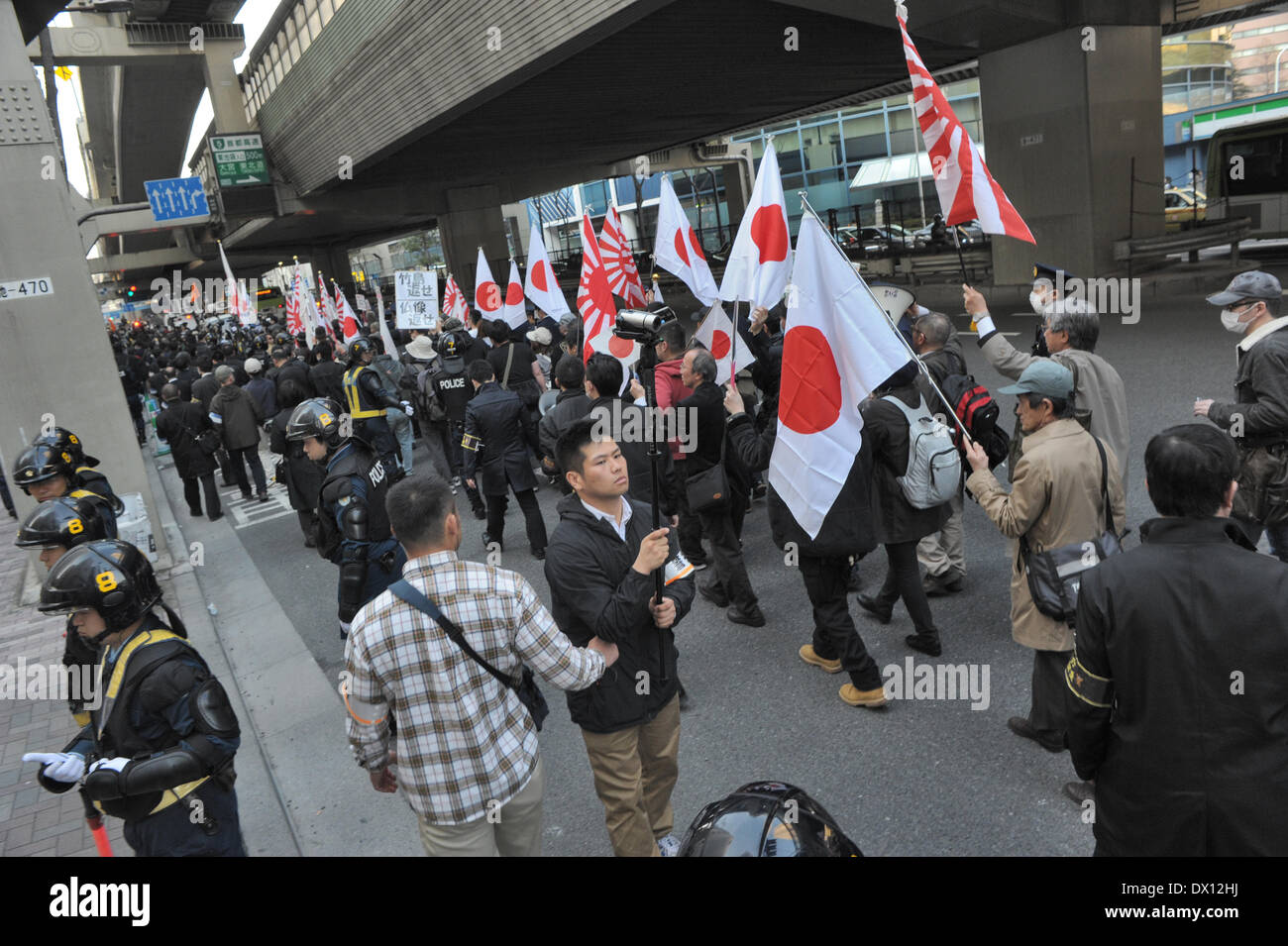 Tokyo, Japan. 16th Mar, 2014. Anti-racist Japanese clashed with members ...