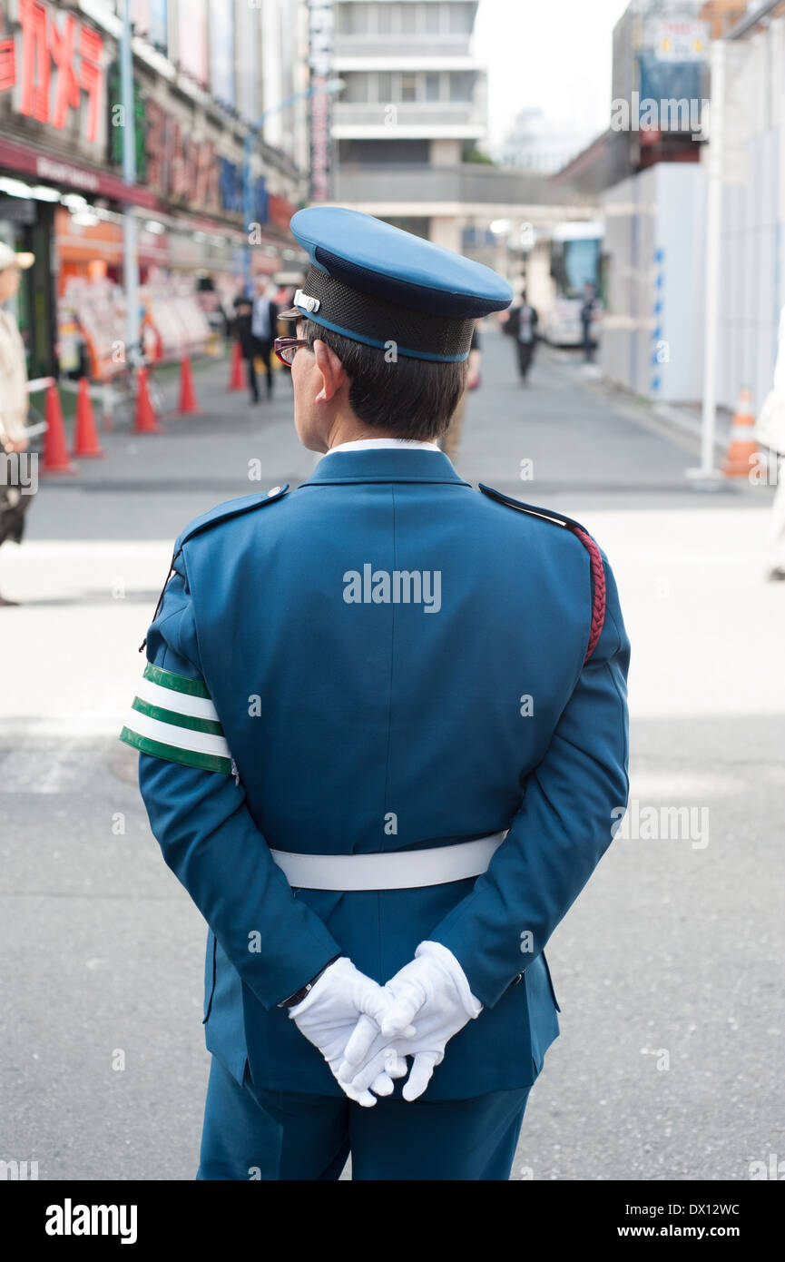 Tokyo security guard hi-res stock photography and images - Alamy
