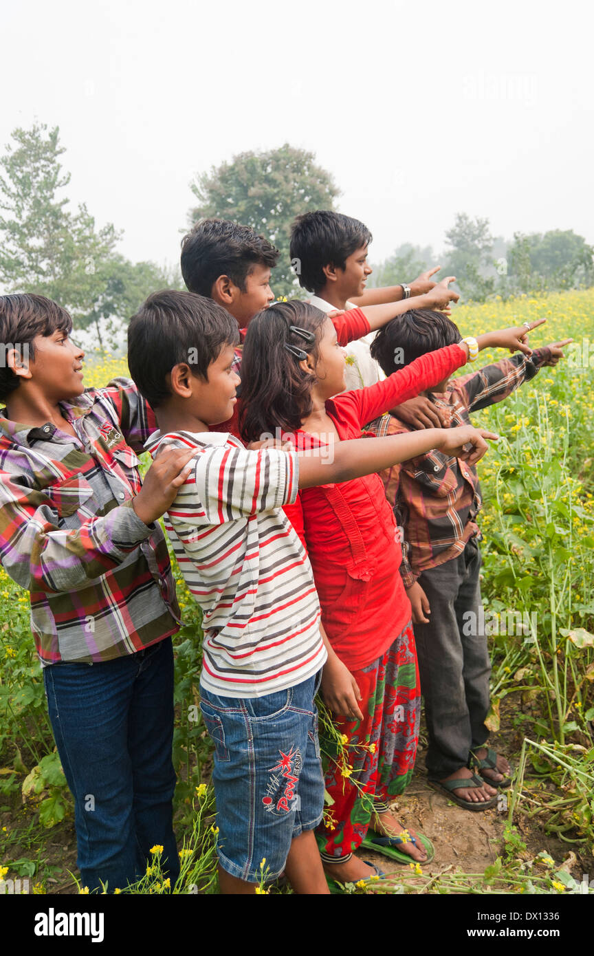 Indian Rural Kids Standing in farms Stock Photo - Alamy