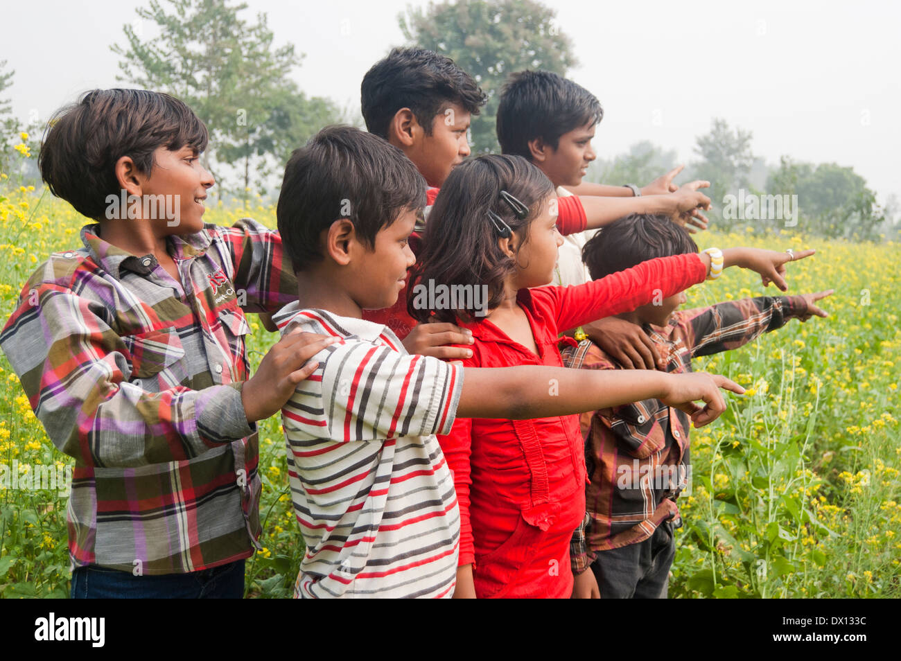 Indian Rural Kids Standing in farms Stock Photo - Alamy