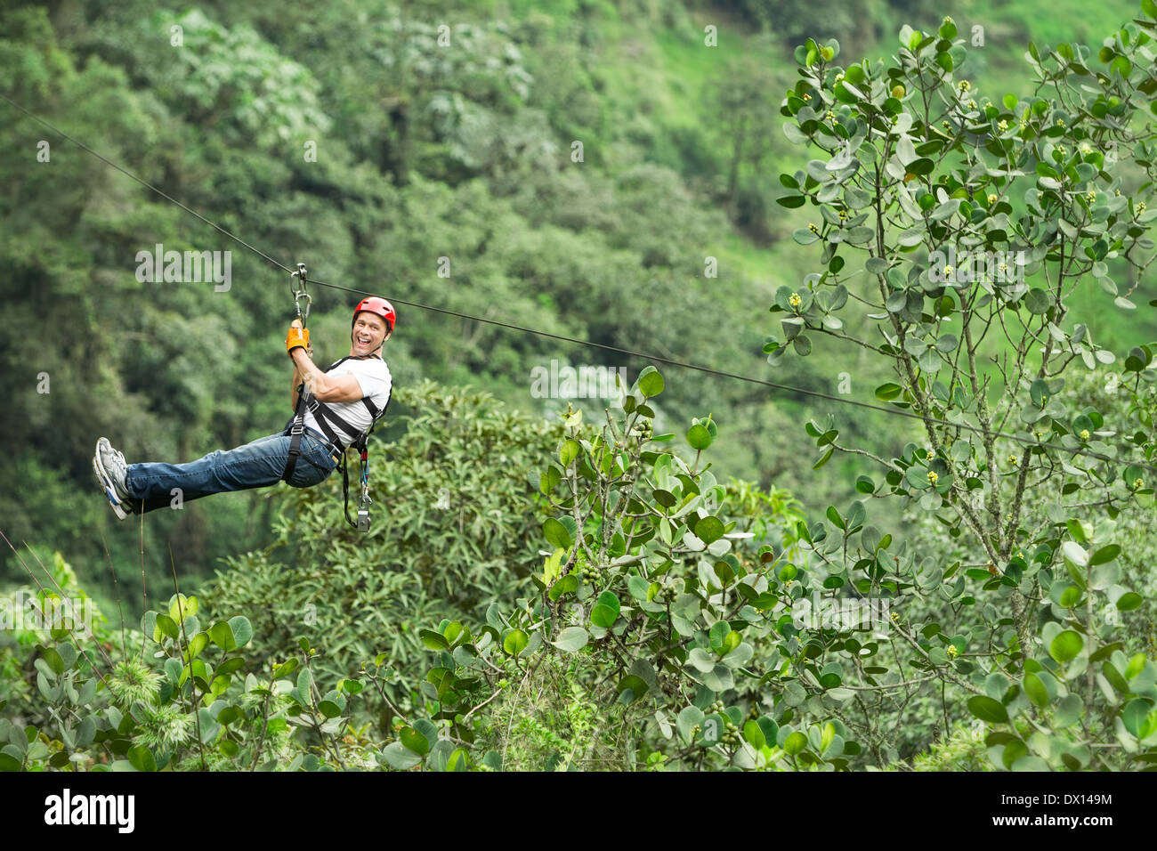 Adult Man On Zip Line Ecuadorian Andes High Altitude Stock Photo - Alamy