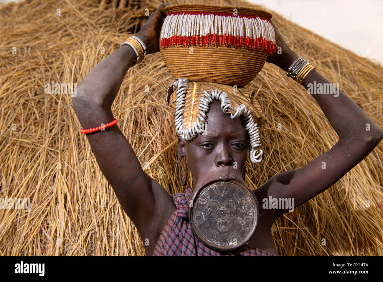 Mursi woman lip plate in hi-res stock photography and images - Alamy