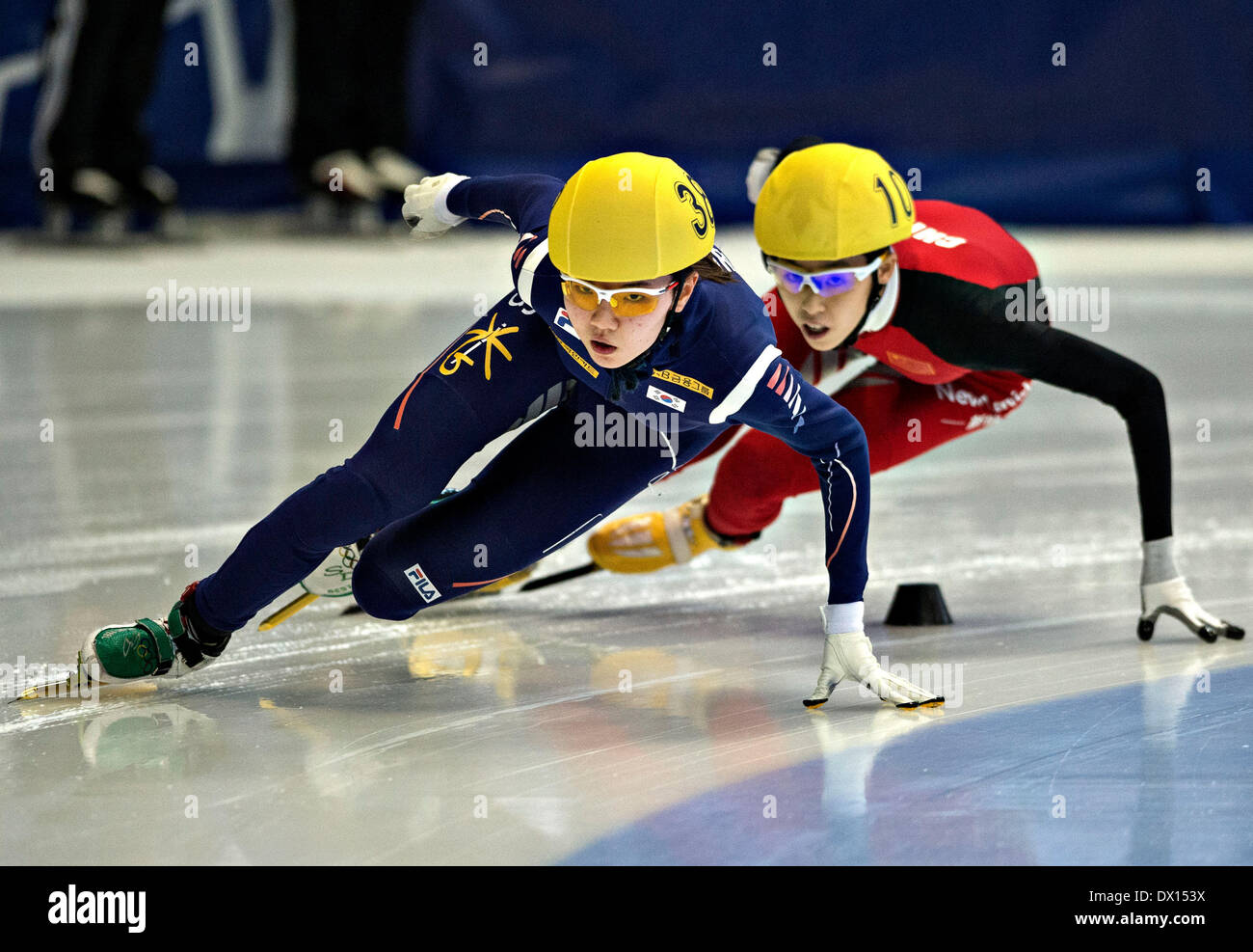 Montreal, Canada. 16th Mar, 2014. Fan Kexin of China(R) competes during ...