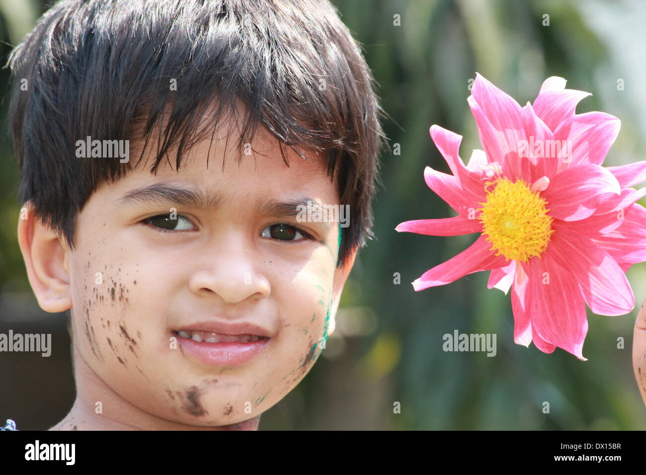 Kankarbagh, Patna, Bihar, India, 17th March 2014. Child plays with ...