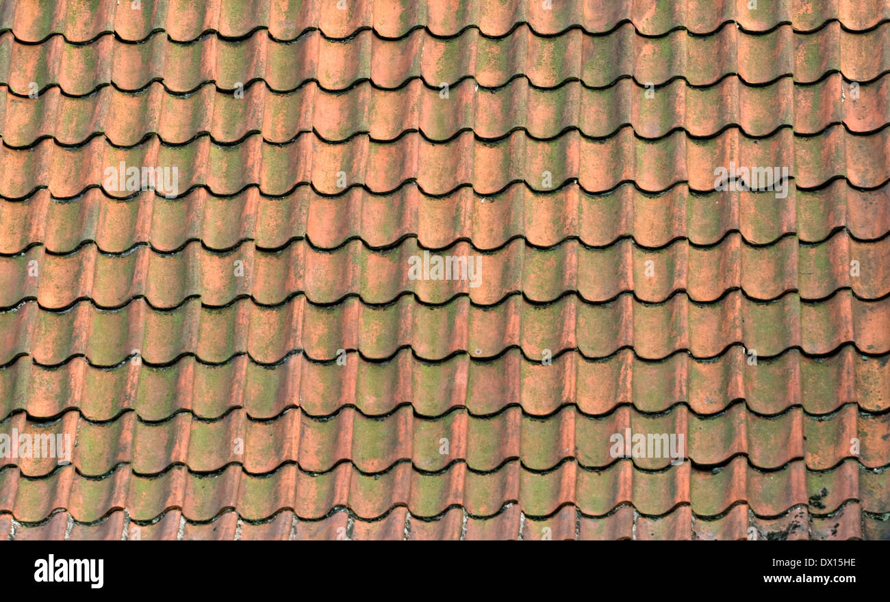 Roof of a house covered with old red tiling Stock Photo - Alamy