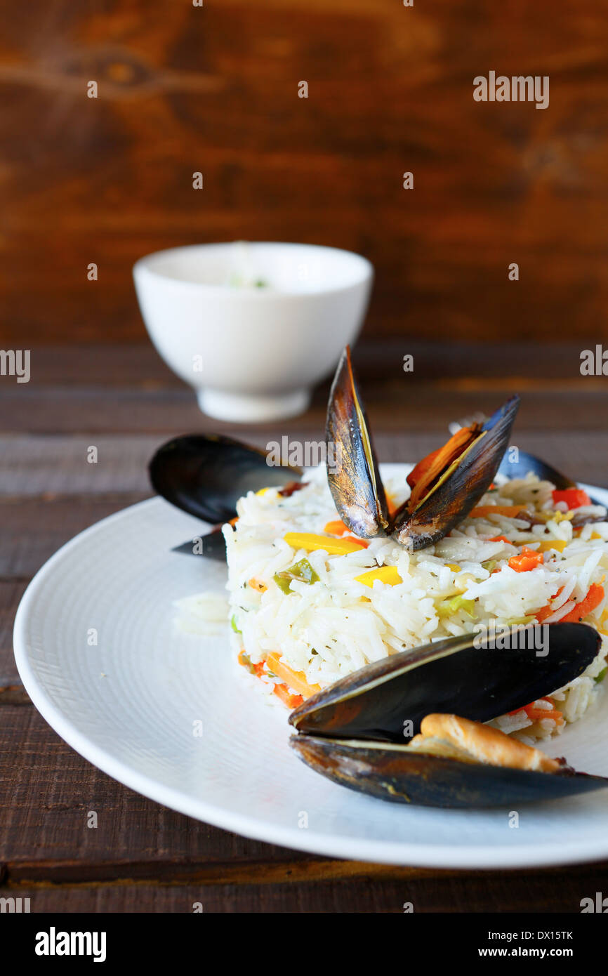 rice with mussels and vegetables, food closeup Stock Photo - Alamy