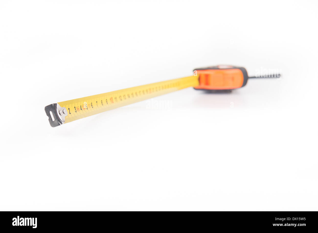 Tape measure isolated on white background Stock Photo - Alamy