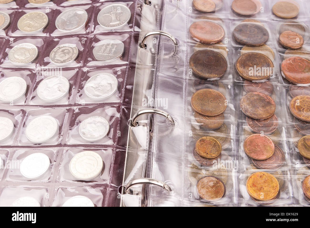 Coin album hi-res stock photography and images - Alamy