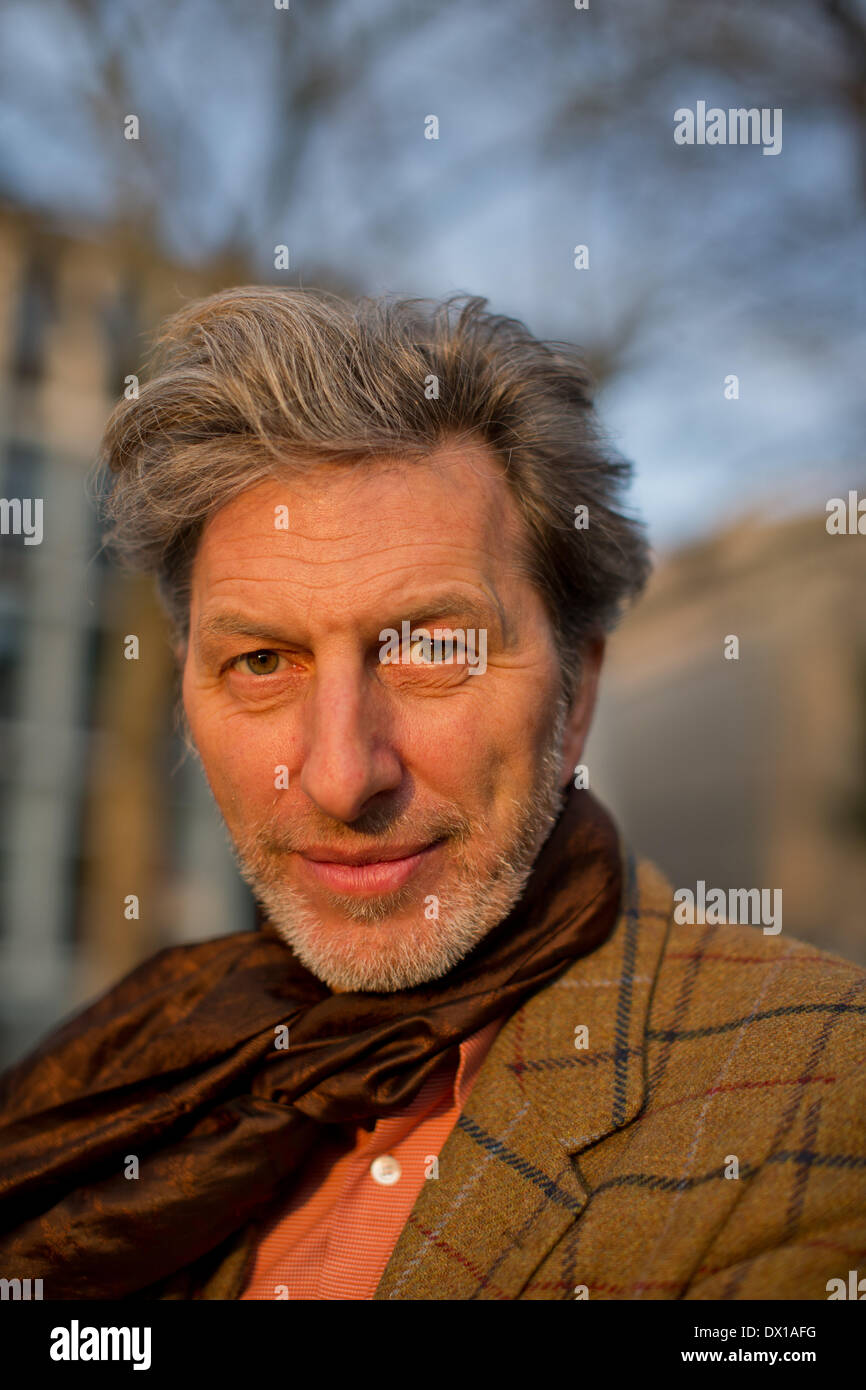 Cologne, Germany. 16th Mar, 2014. German actor Rufus Beck poses at the ...