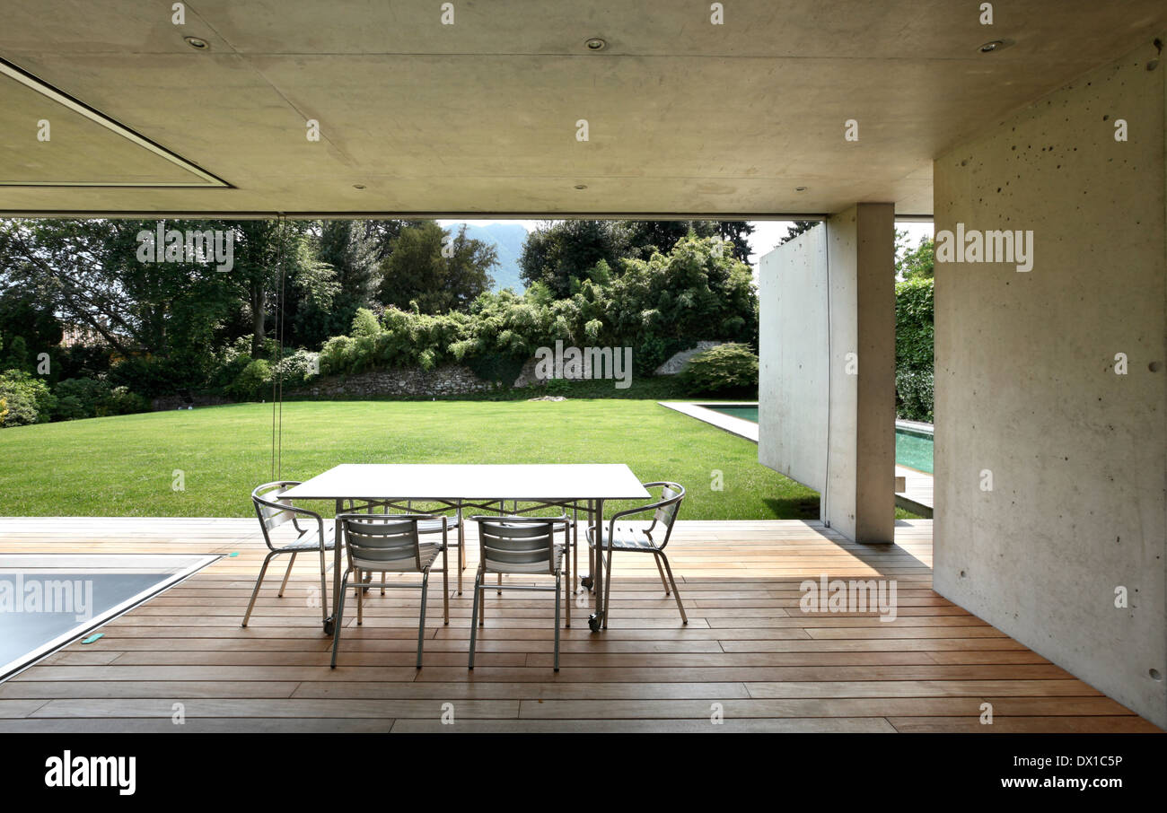 Veranda of a modern house with a beauty pool Stock Photo - Alamy