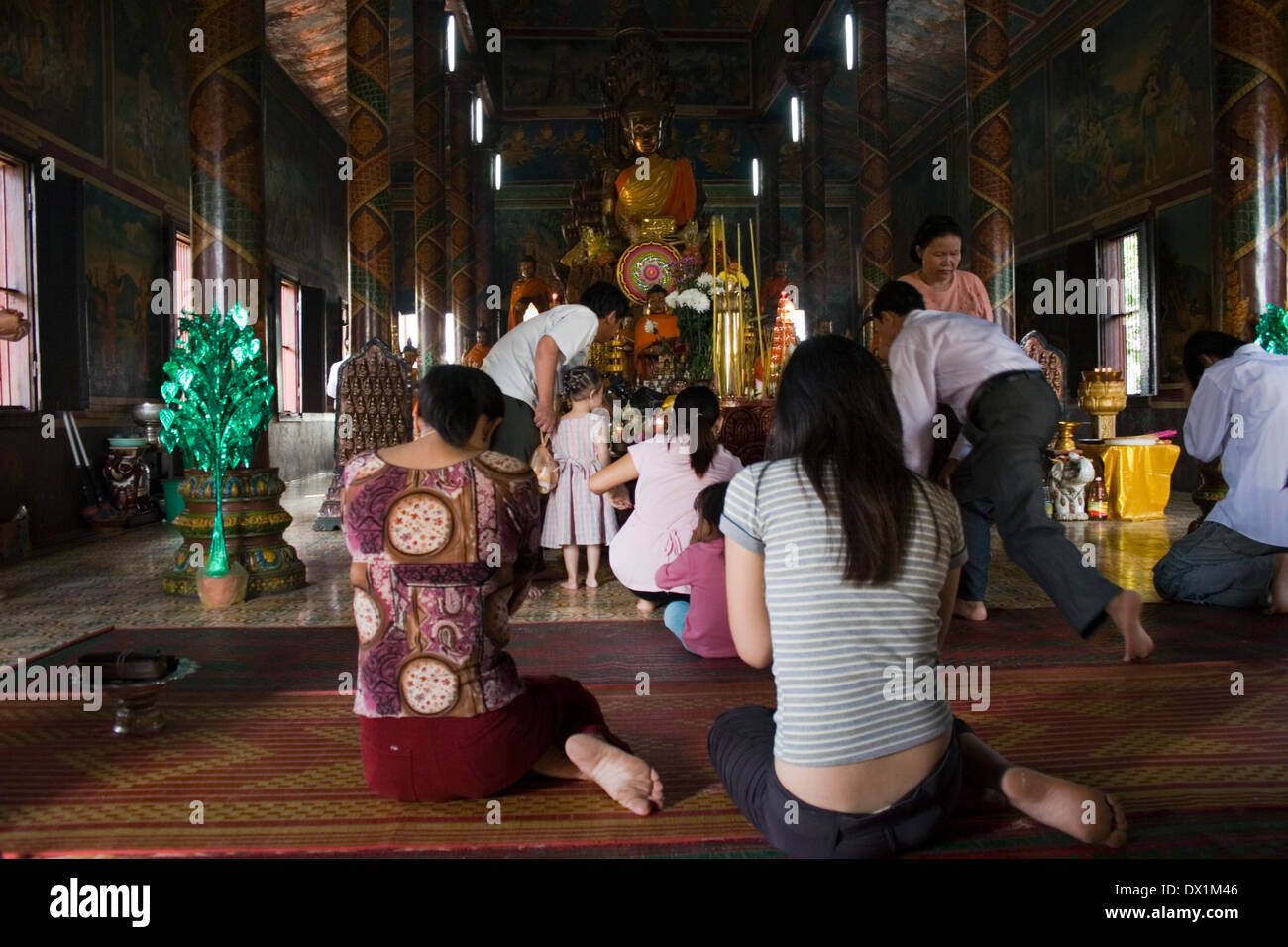 Buddhist laypeople are paying homage to the teachings of Buddha at a ...