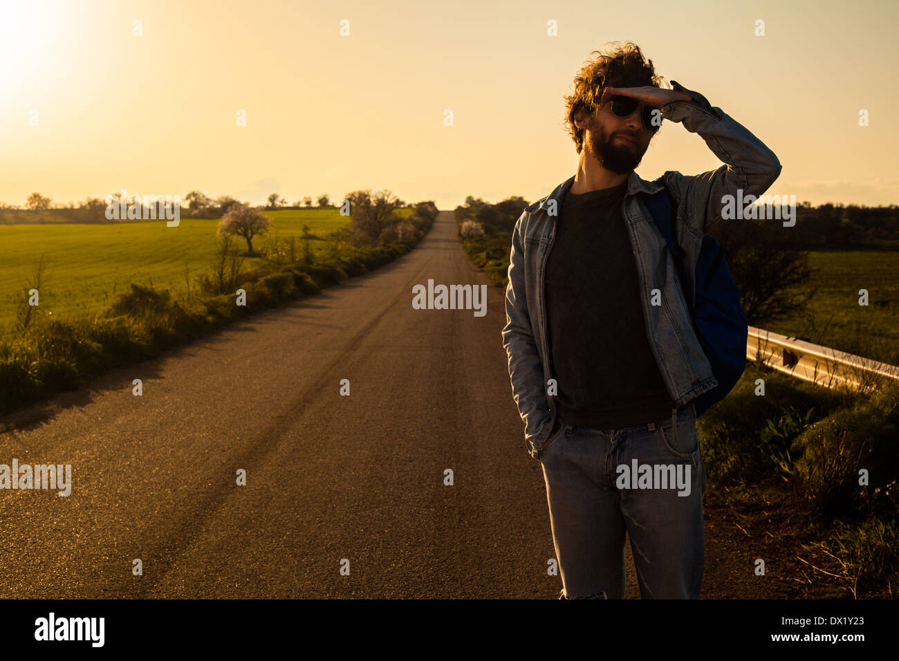 On the Road Traveler Searching the Horizon Stock Photo - Alamy